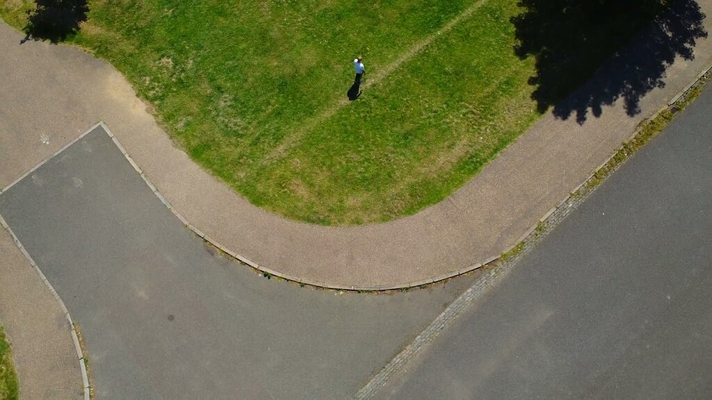 Top down view of people walking in a park - Videos by Drone - Grey ...